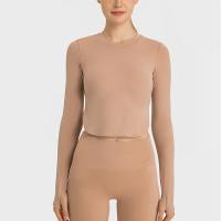 China Sexy Split Ladies Yoga Tops Workout Women Long Sleeve Shirts With Removable Pad for sale