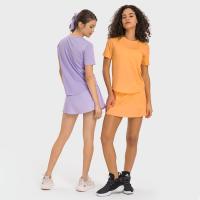 China Women's Athletic Golf Tennis Skorts Skirts with Pockets Built-in Shorts for sale
