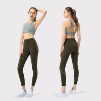 China Nude Yoga Set Clothes Nylon Sweat Wicking Hip Lift Two Piece Athletic Sets for sale