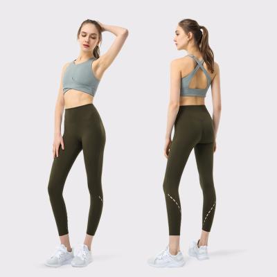 China Nude Yoga Set Clothes Nylon Sweat Wicking Hip Lift Two Piece Athletic Sets for sale