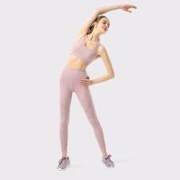 China Hollow Out Knot Yoga Set Clothes Big Hidden Back Pocket Yoga Leggings Set for sale