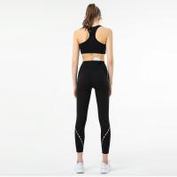 China Hollow Out Knot Yoga Set Clothes Big Hidden Back Pocket Yoga Leggings Set for sale