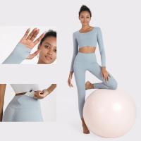 China High Waist Yoga Workout Clothes Breathable Yoga Leggings Top Set With Thumb Hole for sale