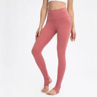 China Solid Color Sports Capri Pants Slim Fit High Waisted Yoga Leggings With Pockets for sale