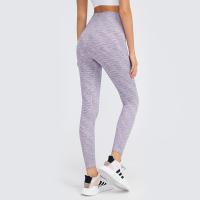 China Yarn Dyed Weaving Women's Stretch Patterned Yoga Pants Nylon Polyester Spandex for sale