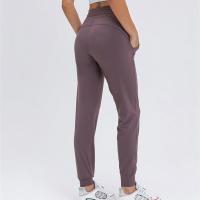 China Jogger Workout Side Pocket Yoga Pants Nylon Moisture Wicking For Women for sale