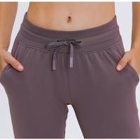 China Jogger Workout Side Pocket Yoga Pants Nylon Moisture Wicking For Women for sale
