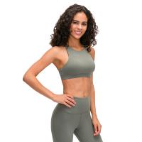 China Padded Yoga Moisture Wicking Shockproof Bra Cross Back Round Neck Sports Bra for sale