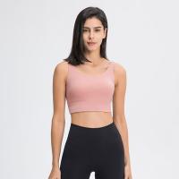 China Latest U-Shaped Elastic Women Sports Bra Wide Strap Female Fitness Tank Top With Pad for sale