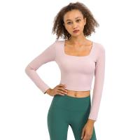 China Ladies Yoga Tops High Elastic Long Sleeve Womens Shirts With Bra for sale