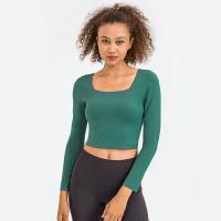 China Ladies Yoga Tops High Elastic Long Sleeve Womens Shirts With Bra for sale