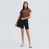 China Quick Drying Loose Short Sleeve T Shirt Womens Fitting Yoga Crop Tops for sale
