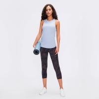 China Skin Friendly Ladies Yoga Tops Bandage Back Loose Sleeveless Yoga Tank Tops for sale