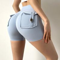China Buttocks Back Pocket Yoga Pants High Waisted Booty Scrunch Workout Shorts for sale