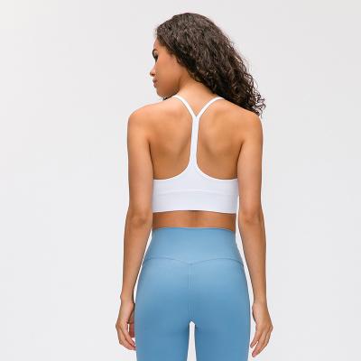 China Flow Y Back Solid Color Sports Bra Pro Skin Widened Hem For Running Yoga Gym for sale