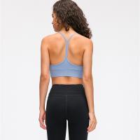 China Flow Y Back Solid Color Sports Bra Pro Skin Widened Hem For Running Yoga Gym for sale