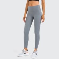 China Hip Lifting High Waisted Tights Pants Nylon Women's Yoga Pants With Side Pockets for sale