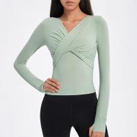 China Cross Folded Ladies Yoga Tops Long Sleeve V Neck Sports Shirts With Thumb Hole for sale