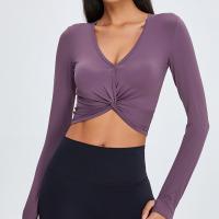 China Sexy Kink V Neck Workout Tops Exposed Nude Ladies Sports Top for sale