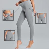 China Nude Ladies Plus Size Sports Leggings Hip Lifting Gym Leggings With Pockets for sale