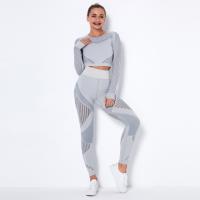 China Hygroscopic Womens Long Sleeve Gym Set Hollow Seamless Yoga Gym Set for sale