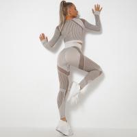 China Hygroscopic Womens Long Sleeve Gym Set Hollow Seamless Yoga Gym Set for sale