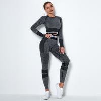 China Seamless Yoga Set Clothes Knitted Striped Quick Drying Yoga Leggings And Top Set for sale