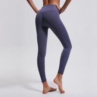 China Women'S High Waist Sports Pocket Yoga Pants Solid Color Tight for sale