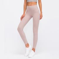 China No Front Seam Yoga Pants Capri Customized Logo Tummy Control Butt Lifting Leggings for sale