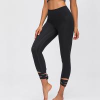 China Strap Leg Women's Stretch Yoga Pants Stretchable Tummy Control Workout Capris for sale