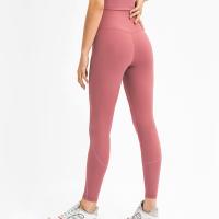 China Moisture Wicking Nude Yoga Leggings Nylon Sports High Waisted Workout Pants for sale