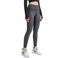 China High Elastic Women's Yoga Tight Pants Naked Feeling Nylon Leggings With Pockets for sale