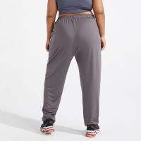 China Women Plus Size Yoga Pants Loose Casual Bind Feet Athletic Workout Leggings for sale