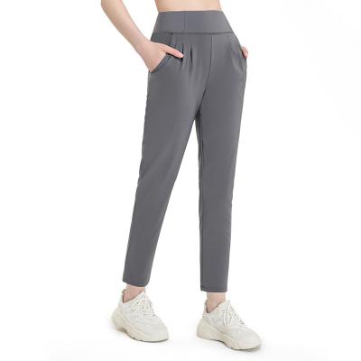 China Casual Straight Nylon Pocket Yoga Pants Nude Sports Leggings for sale