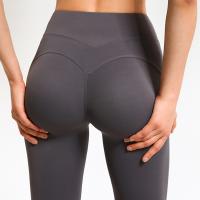 China Elastic Peach Hip Lifting Fitness Yoga Tights Pants Scrunch Butt Leggings Naked Matte for sale