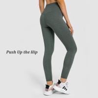 China 220gsm 80% Nylon Women Fitness Yoga Pants Shaping Multi Pocket Sports Leisure Capris for sale
