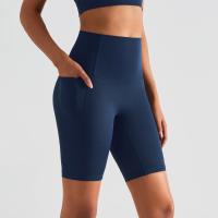 China STC Yoga Women'S Shorts Nude Five Pants Peach Hip Tights Ultra High Waist Pockets for sale