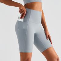 China STC Yoga Women'S Shorts Nude Five Pants Peach Hip Tights Ultra High Waist Pockets for sale