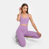 China Sexy Thin Strap Yoga Sports Bras Women Running Tops Built In Removable Pads for sale