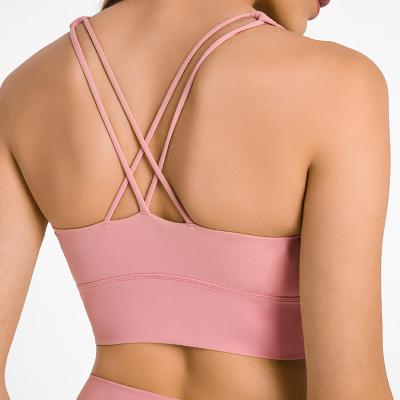 China Sexy Thin Strap Yoga Sports Bras Women Running Tops Built In Removable Pads for sale
