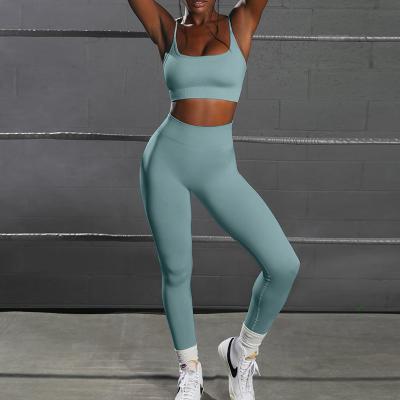 China New Arrival Seamless 2 Pieces Yoga Set For Women Ruched Butt Leggings And Sports Bra for sale