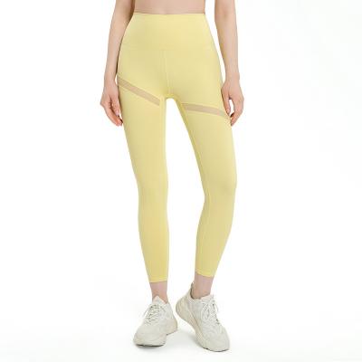 China Traceless Mesh Breathable Yoga Pants Capri Women High Waist Nude Sports Tights for sale