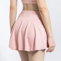 China Solid Color Summer Gym Workout Golf Skorts With Pockets Quick Dry Women'S Tennis Skirts for sale