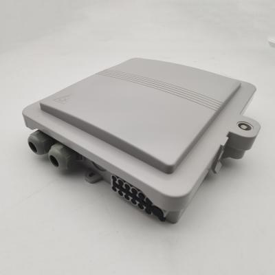 China IP65 Waterproof 12 Ports FTTH Terminal Box with 1x8 Splitter and Wall Mountable Design for sale