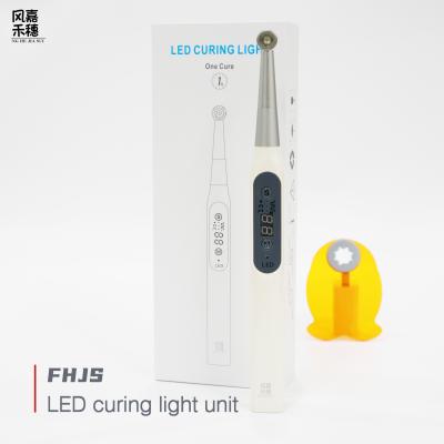 China FHJS Dental Light Curing Unit 460nm Blue Light with 1500-2500mW/cm² Intensity and Magnetic Rotating Head for sale