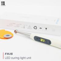 China FHJS Dental Light Curing Unit 460nm Blue Light with 1500-2500mW/cm² Intensity and Magnetic Rotating Head for sale