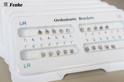China Simple Operating Orthodontic Bracket Attachments With Silver Clear Toothcolored Selections Designed for Orthodontic Care for sale