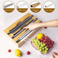 China Slide Cutter Kitchen Drawer Organizer Bamboo 3 in 1 Foil and Plastic Cling Wrap Dispenser for sale