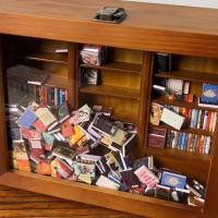 China Wooden Mini Book Matchbox Display Bookshelf Cabinet Contemporary Design for Home Decor for sale
