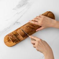 China Gray-White Customized Shape Artisan Olive Wood Baguette Cutting Board for Bread Lovers for sale